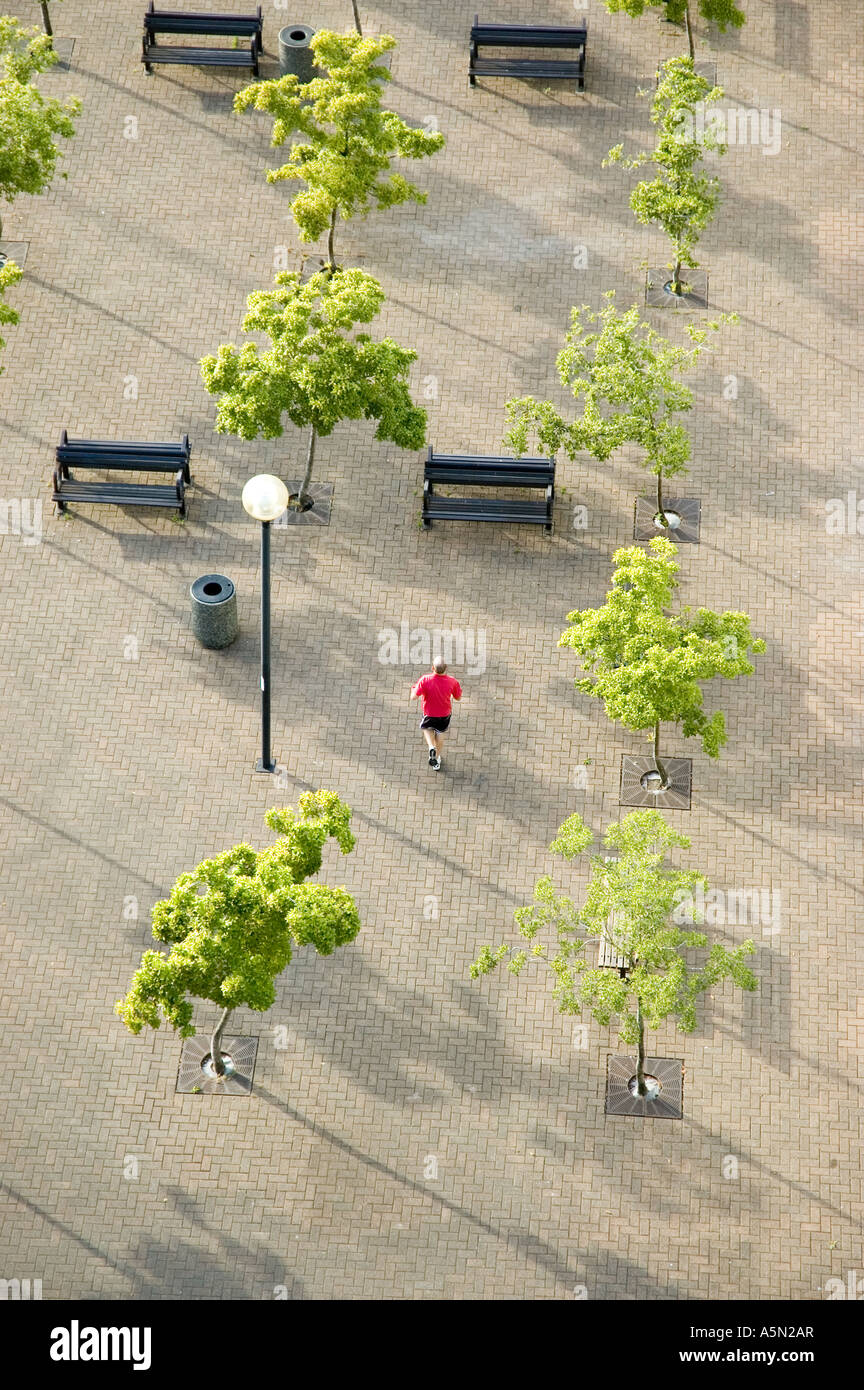 overhead view of a runner jogging through a plaza Vancouver British ...