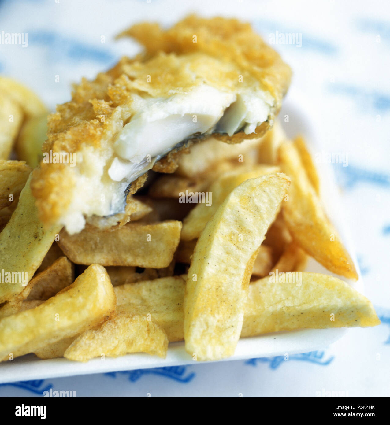a portion of fish and chips Stock Photo - Alamy