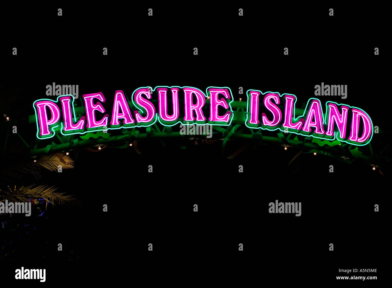 Sign at entrance to Pleasure Island area of Downtown Disney at night ...