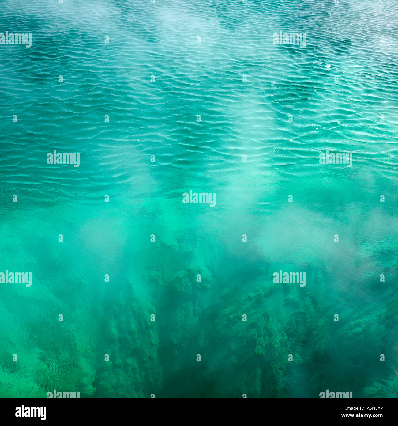 Pool of steaming turquoise water Stock Photo - Alamy