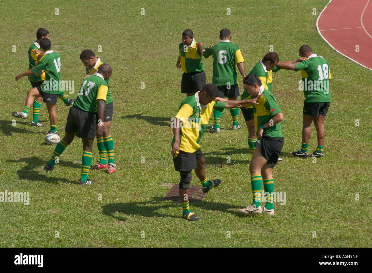 rugby players warming up Stock Photo - Alamy