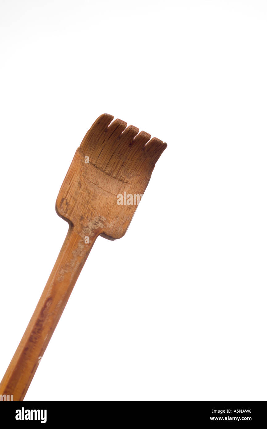 wooden back scratcher isolated cut out Stock Photo - Alamy