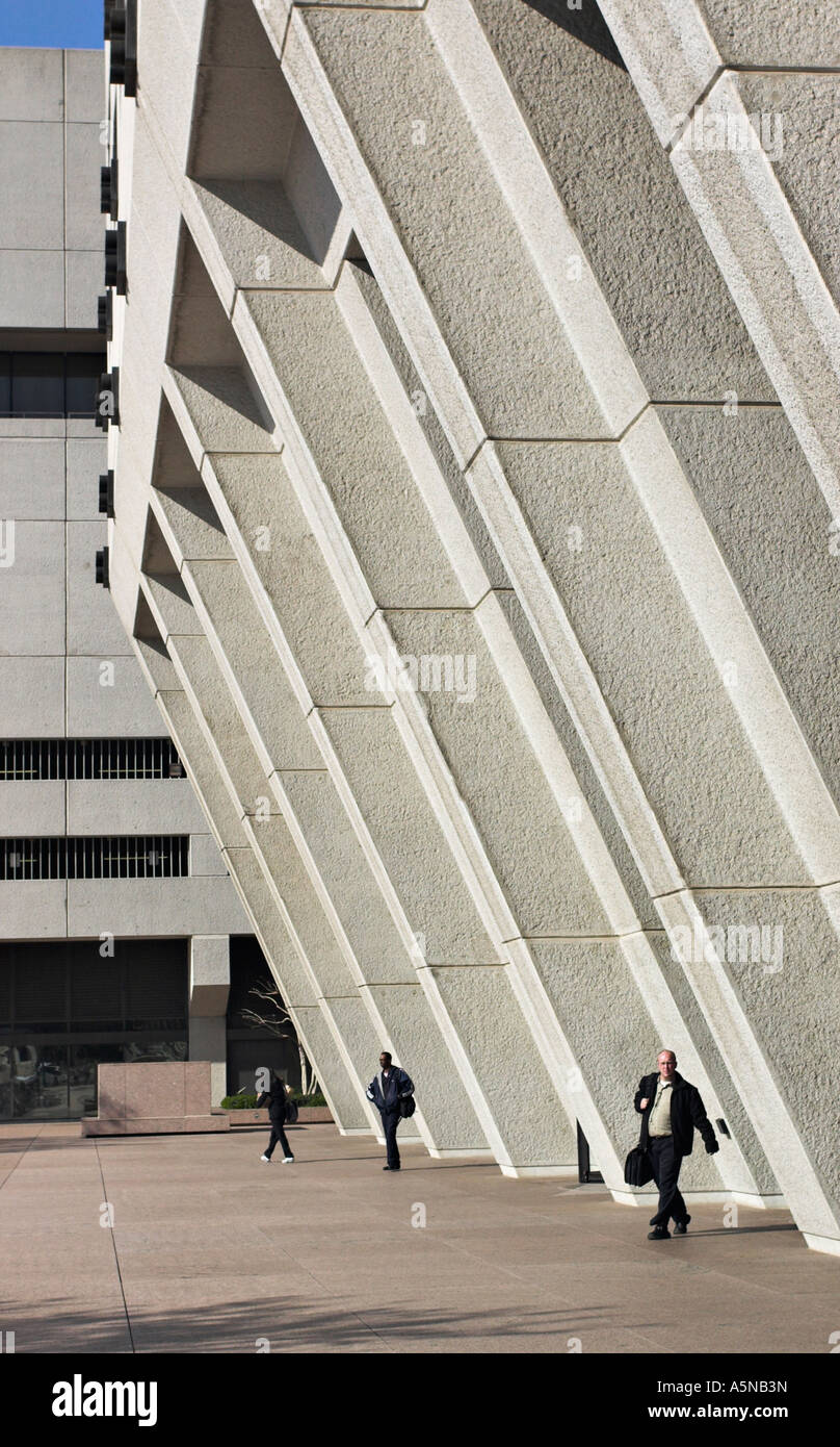 Going Home: Workers leaving the cantilevered Bell South Building are ...