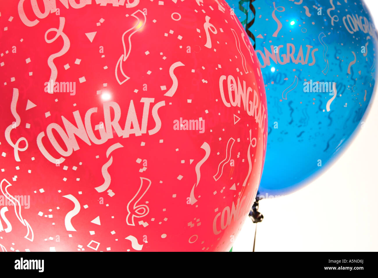 Party Time congratulations Blue and red balloons with streamers and ...