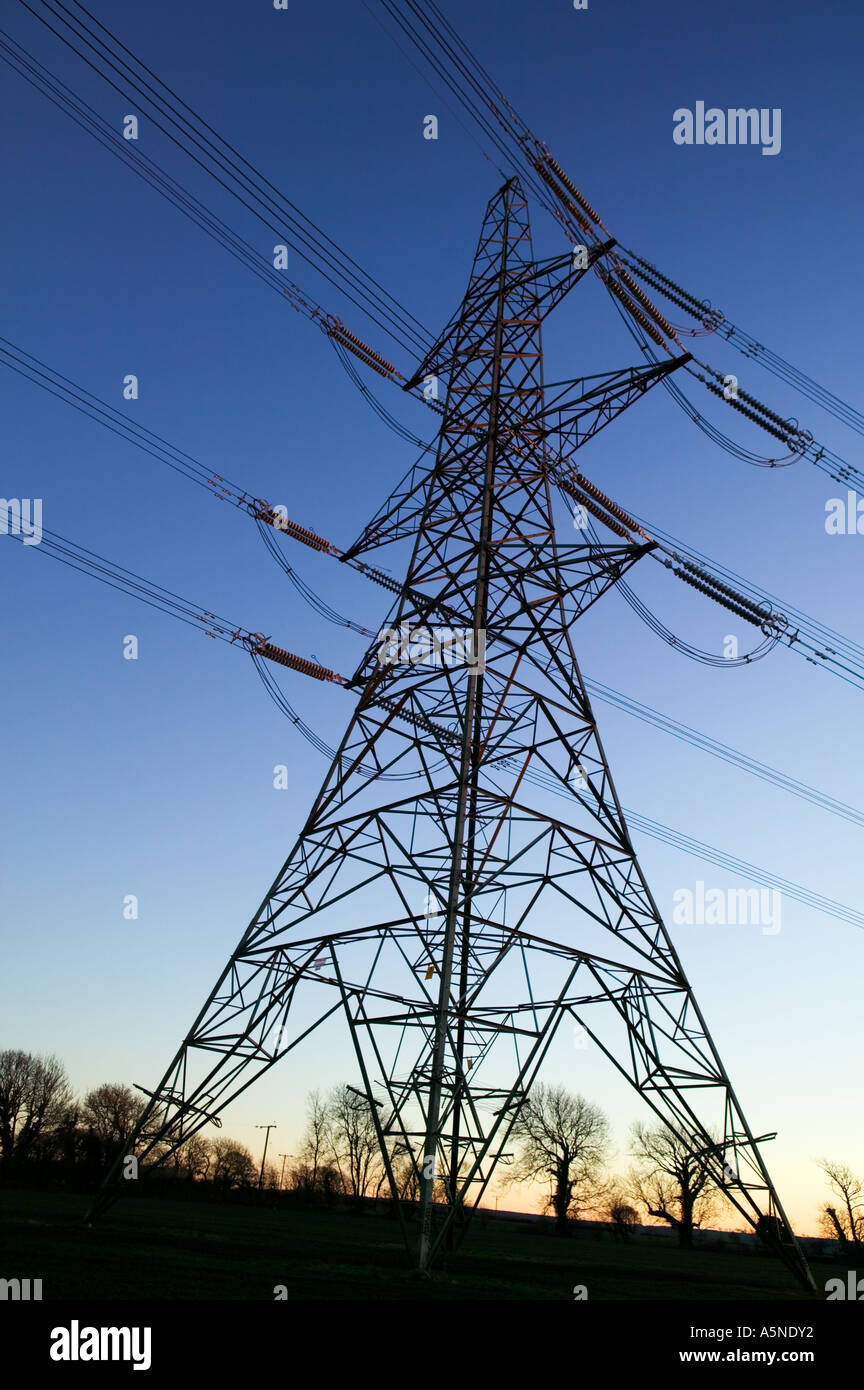 An electricity pylon of the National Grid in Wales at sunset Stock ...