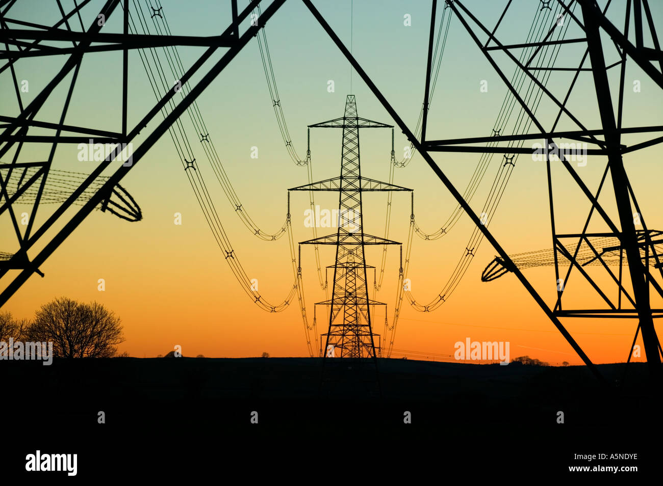 An electricity pylon of the National Grid in Wales at sunset Stock ...