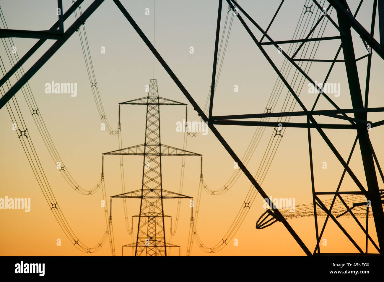 An electricity pylon of the National Grid in Wales at sunset Stock ...