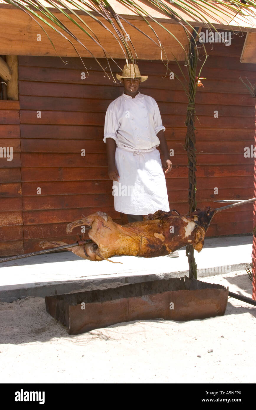 local mauritian roasting a whole pig Stock Photo - Alamy