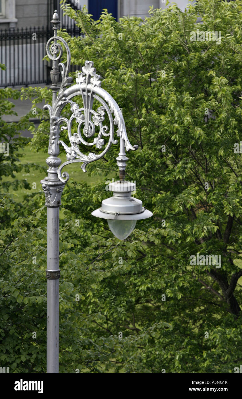 Dublin Street Lamp A decorative silver street lamp its colour offset by ...