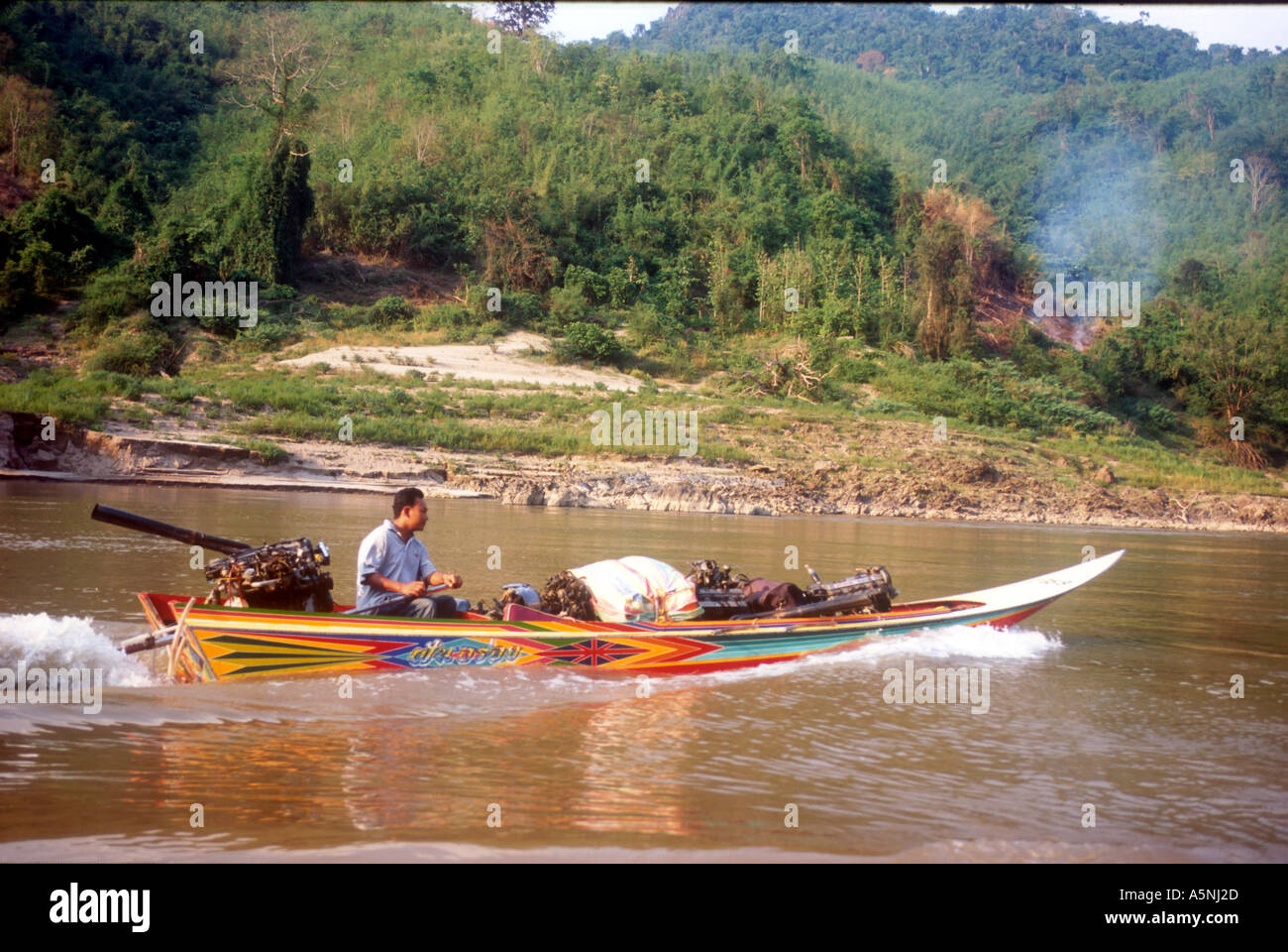 SPEED BOAT TRANSPORT ON THE MEKONG RIVER IN LAOS Stock Photo - Alamy