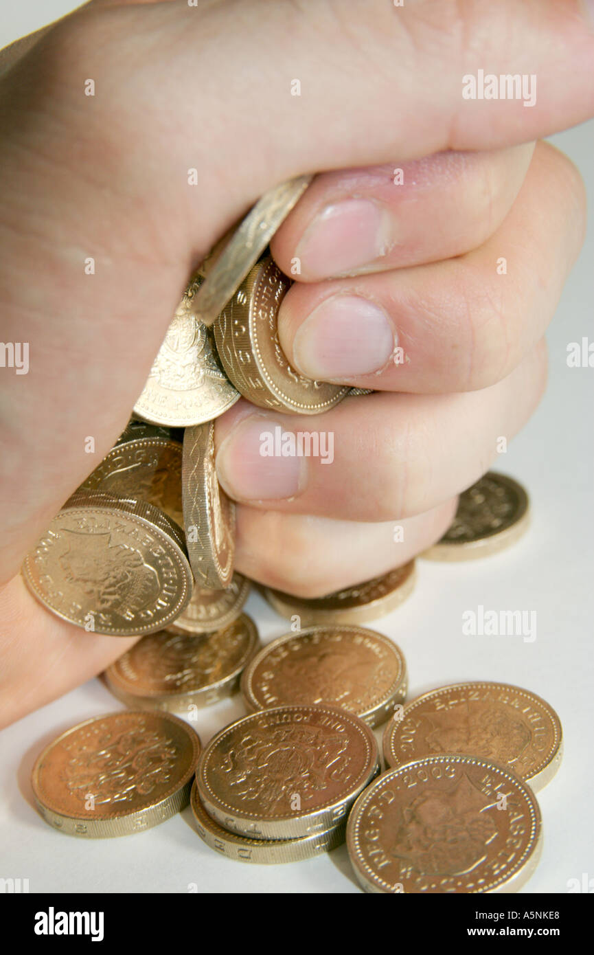 Hand grabbing uk hi-res stock photography and images - Alamy