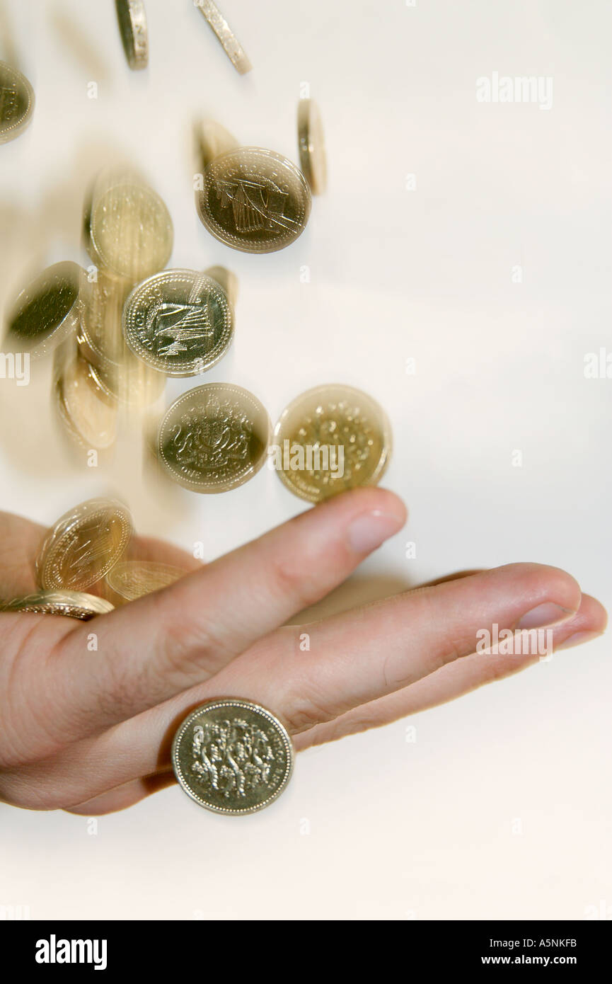 Hand catching cash Stock Photo - Alamy