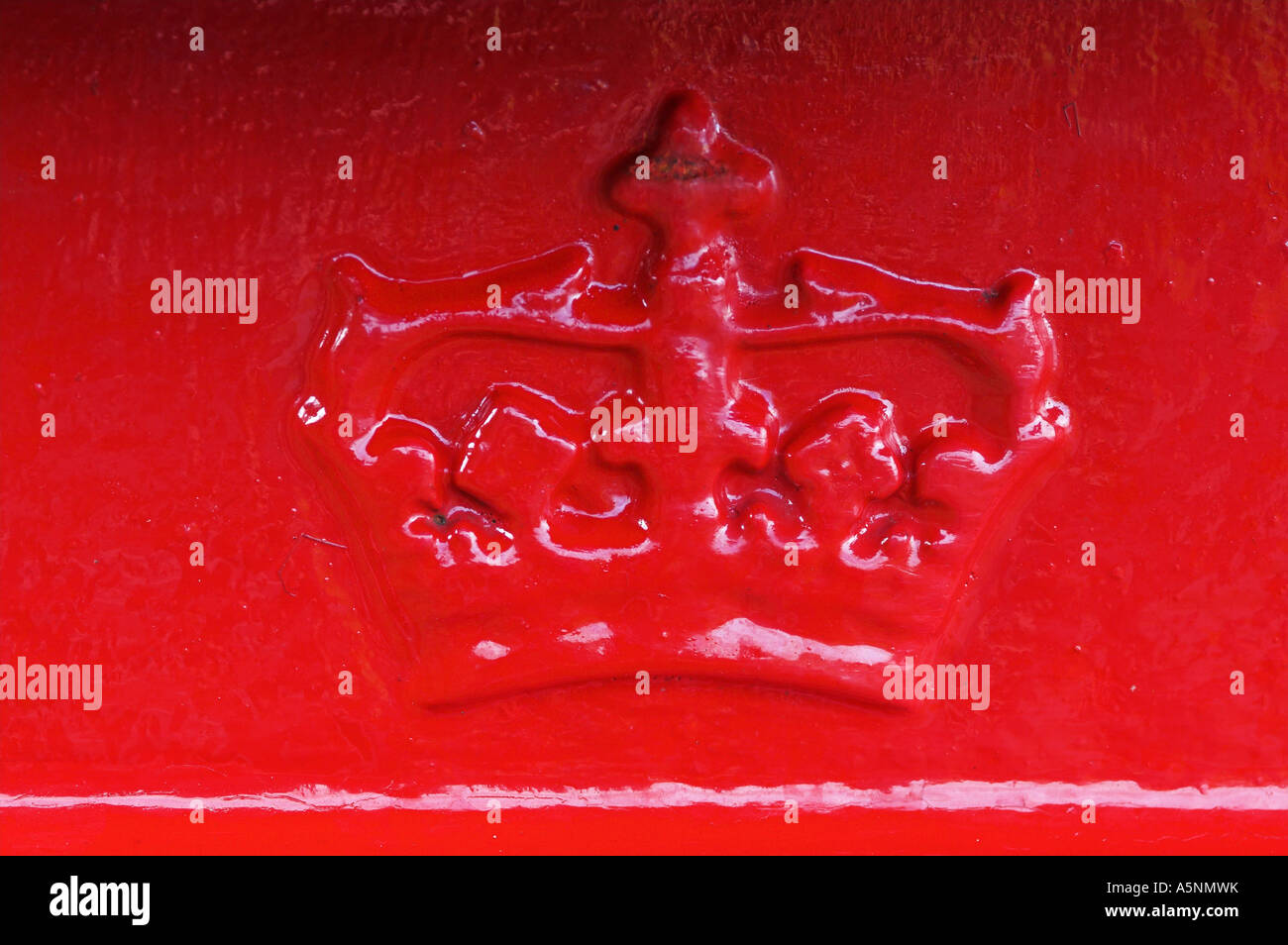 The royal crest, or crown, on a red mail box, in the United Kingdom ...