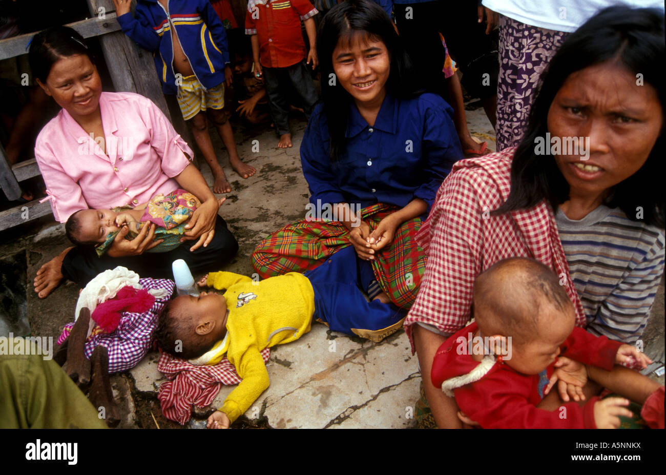 Mother feeding baby cambodia hi-res stock photography and images - Alamy