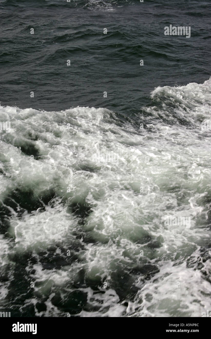waves behind a ship Stock Photo - Alamy