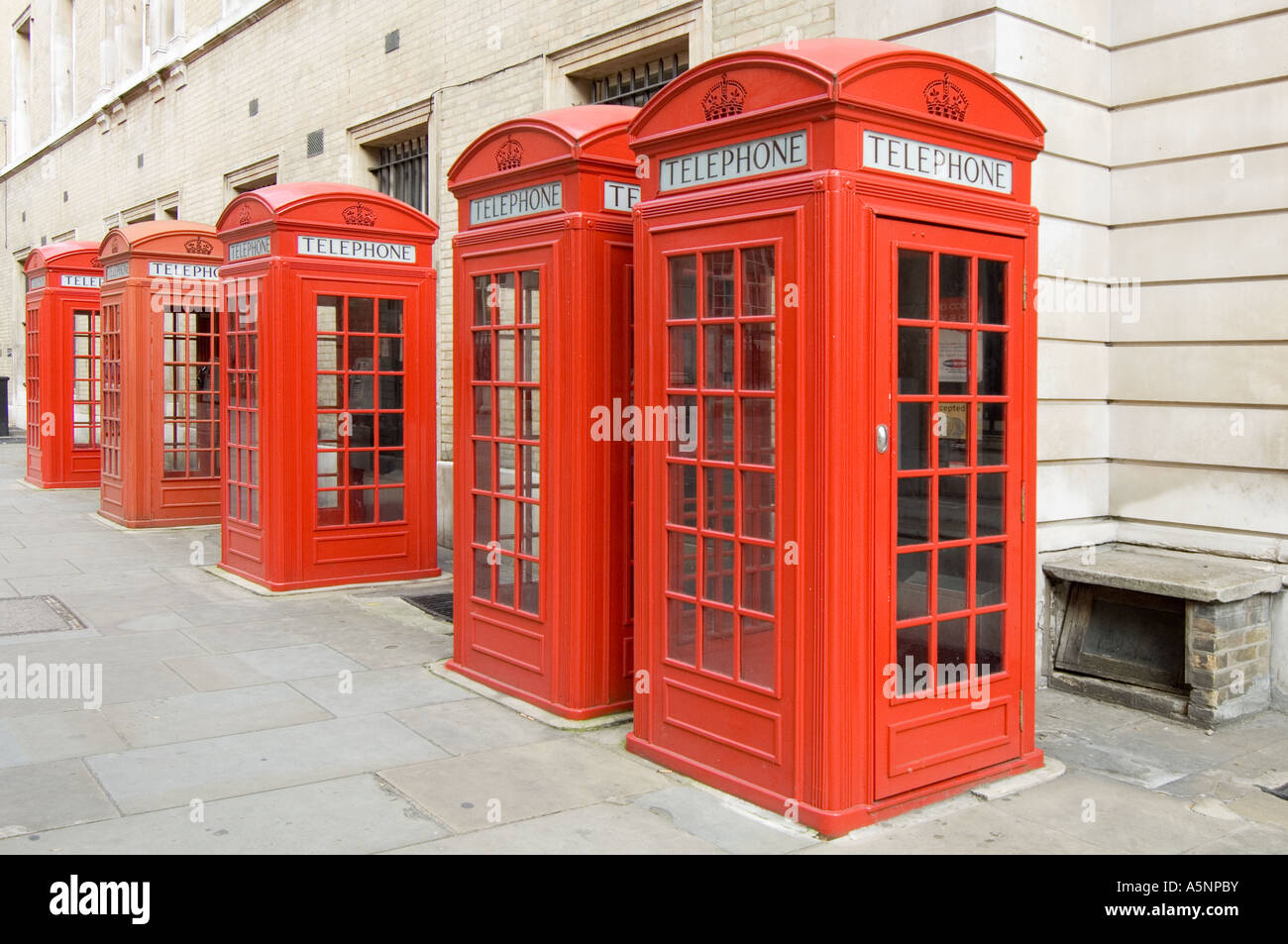 Row of Red telephone booths London Stock Photo - Alamy