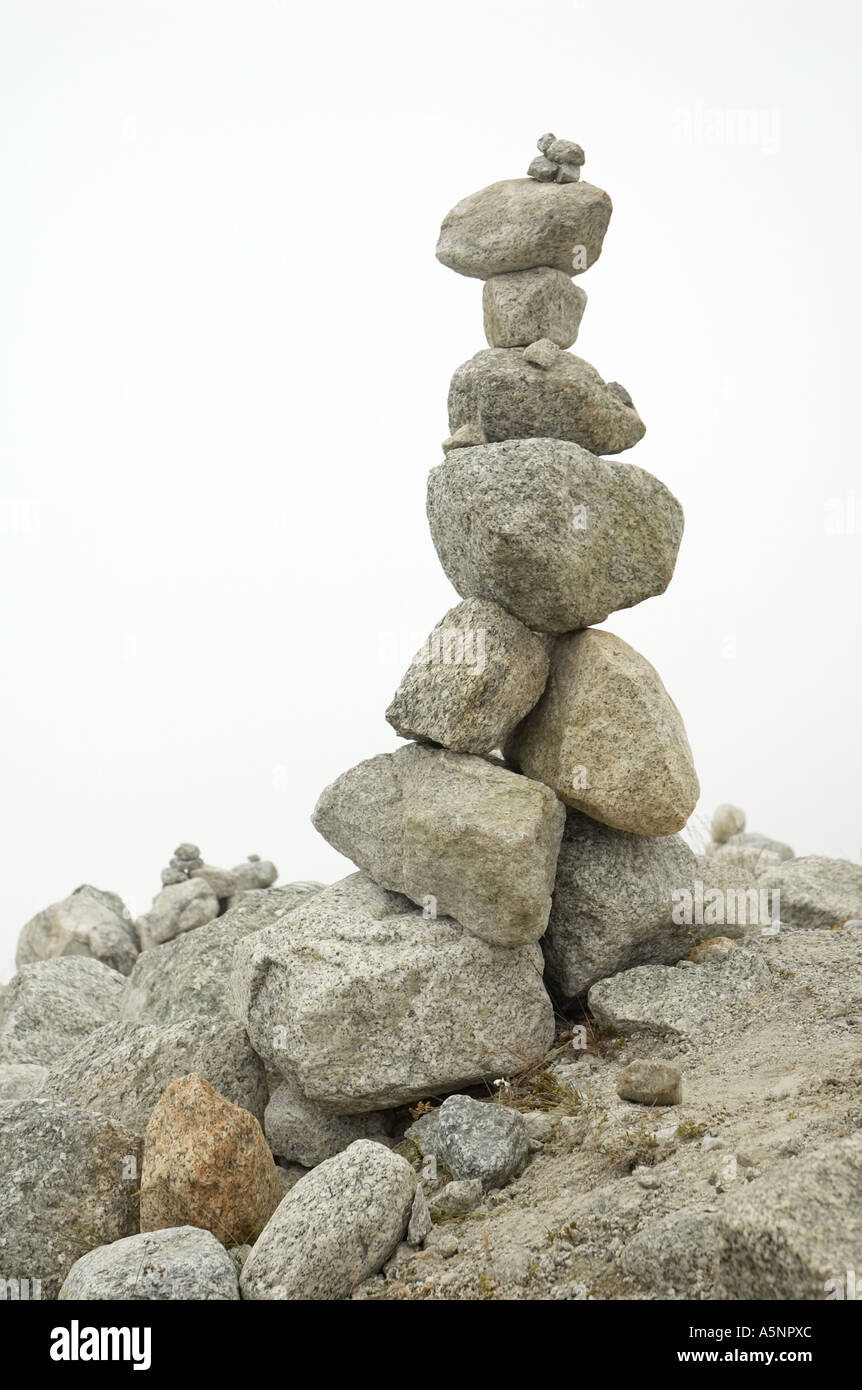 Piles of stones near the ice cave Eisgrotte am Rhonegletscher on Furka ...