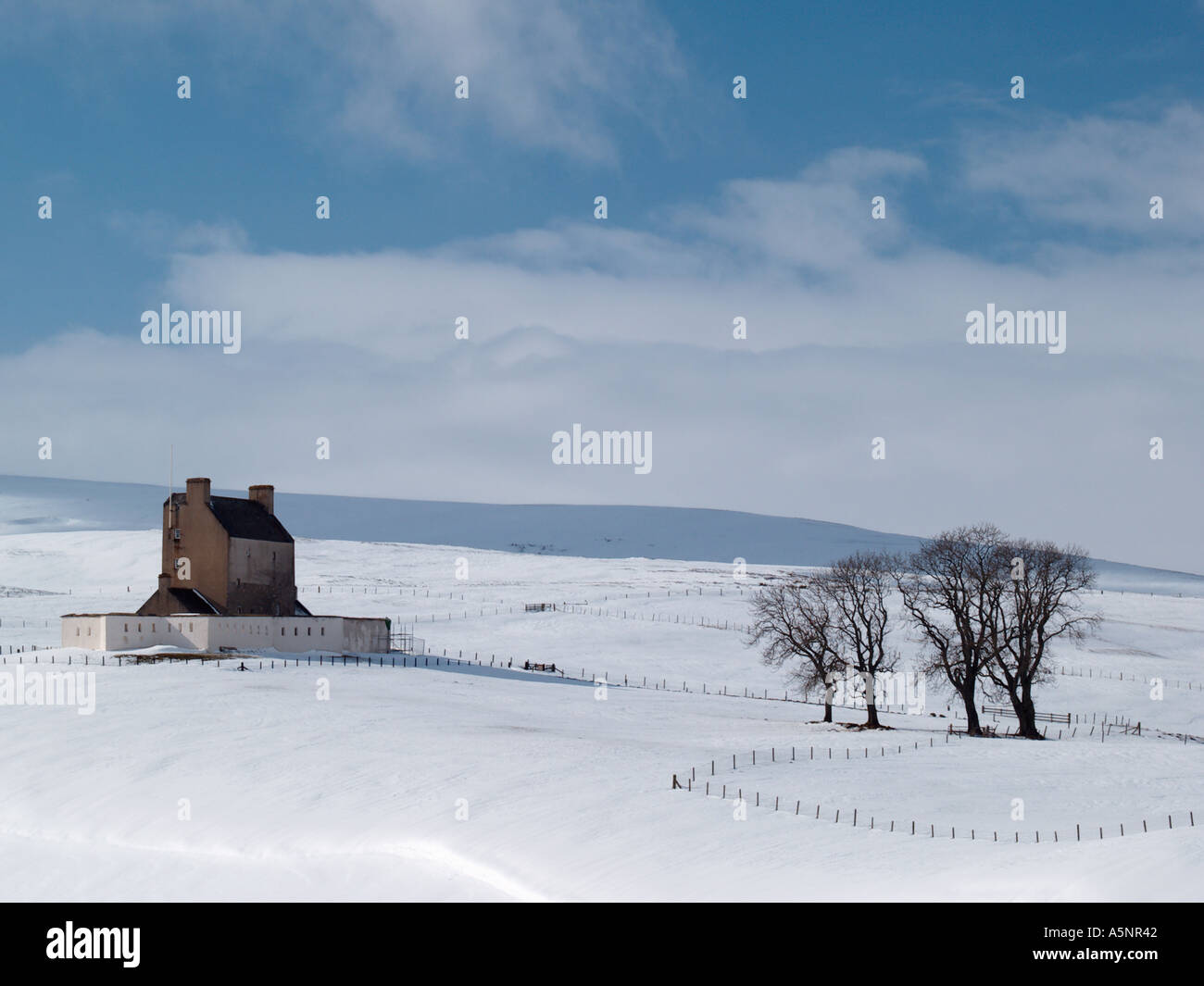 CORGARFF CASTLE 1550 in WINTER with snow on Grampian mountains Corgarff ...