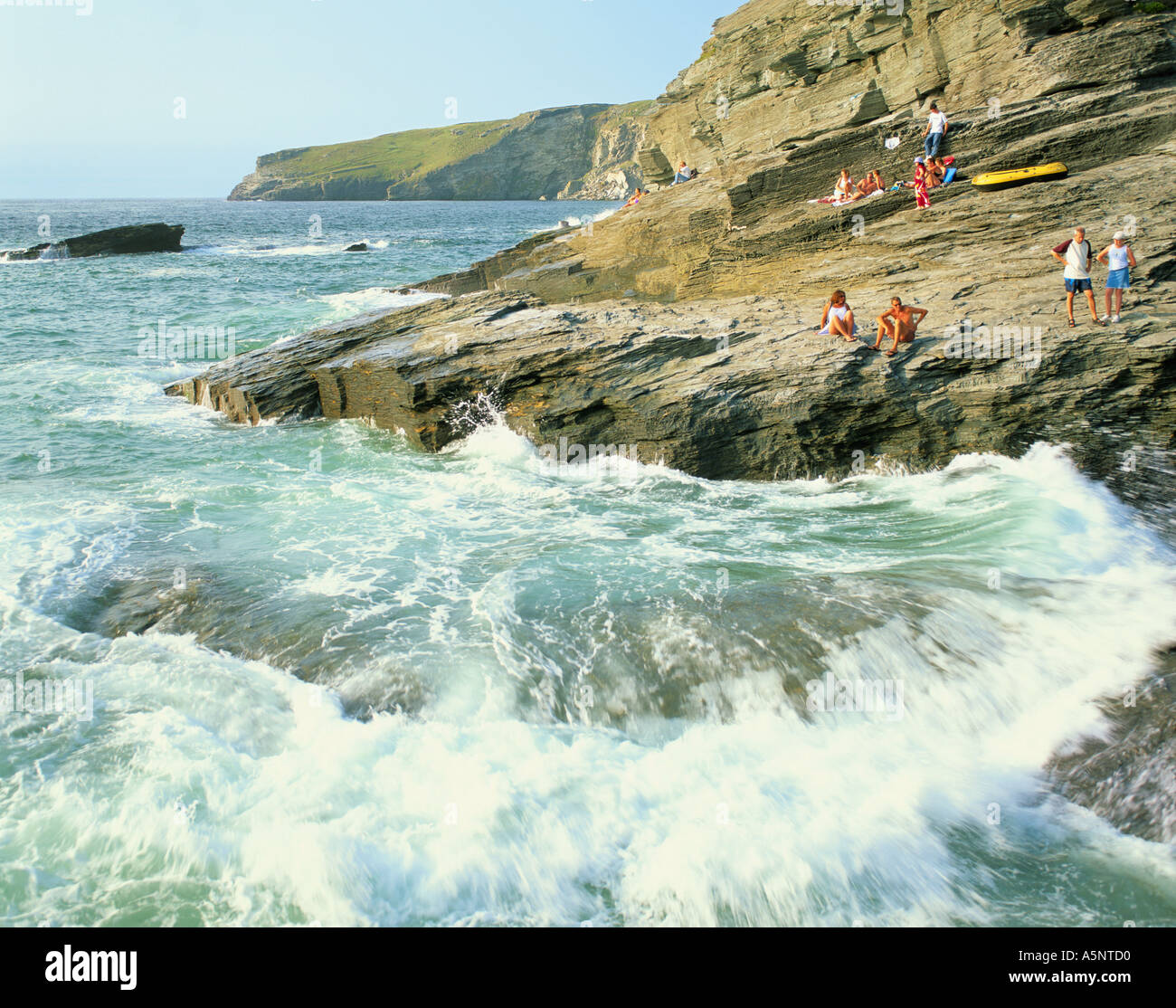 GB Cornwall Trebarwith Strand People Watching Rough Sea Stock Photo - Alamy