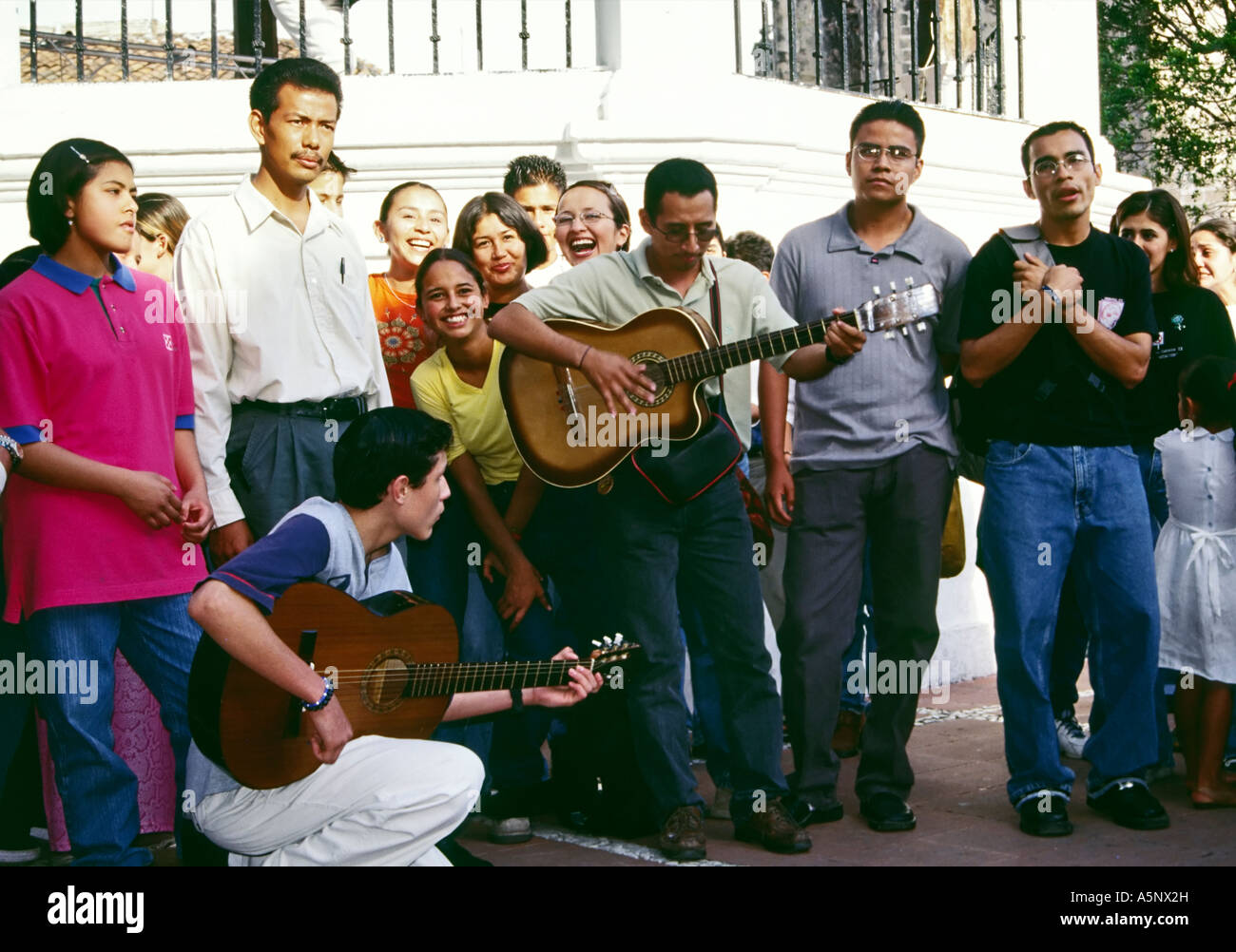 Young people at Plaza Borda Zocalo in Taxco, State of Guerrero, Mexico ...