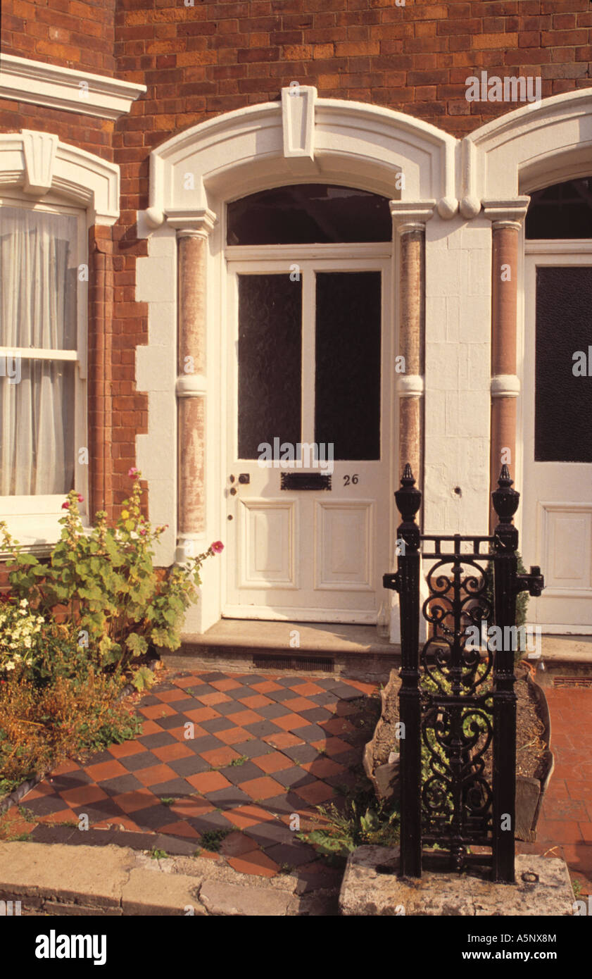 Tiled path to half-glazed front door in Edwardian house Stock Photo - Alamy