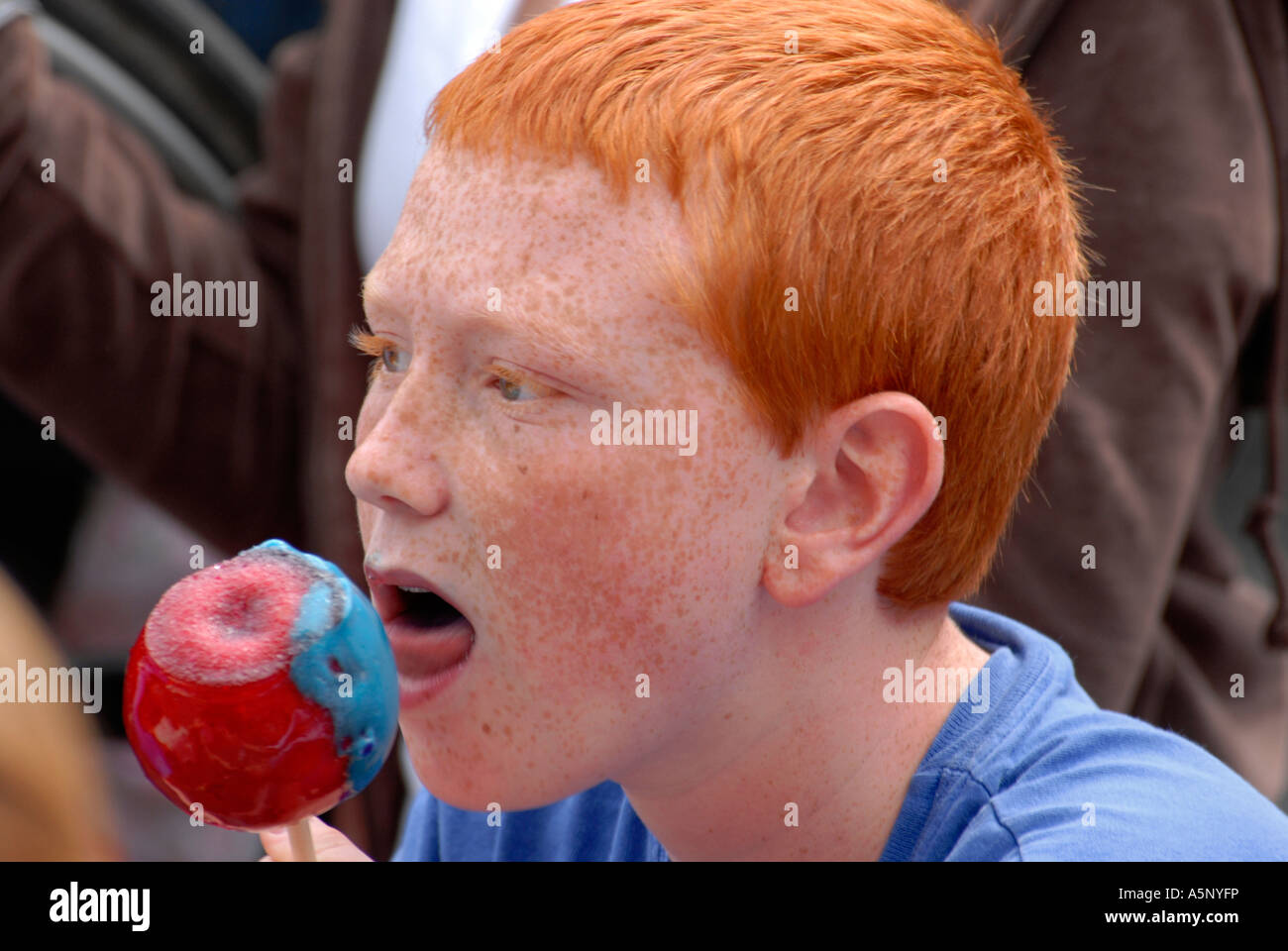 Boy with a candy Stock Photo - Alamy