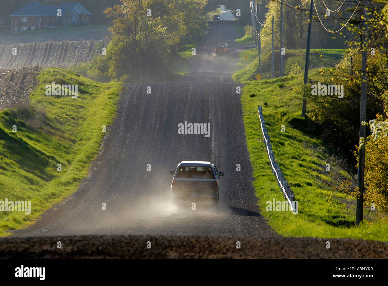 Rural road perspective Stock Photo - Alamy