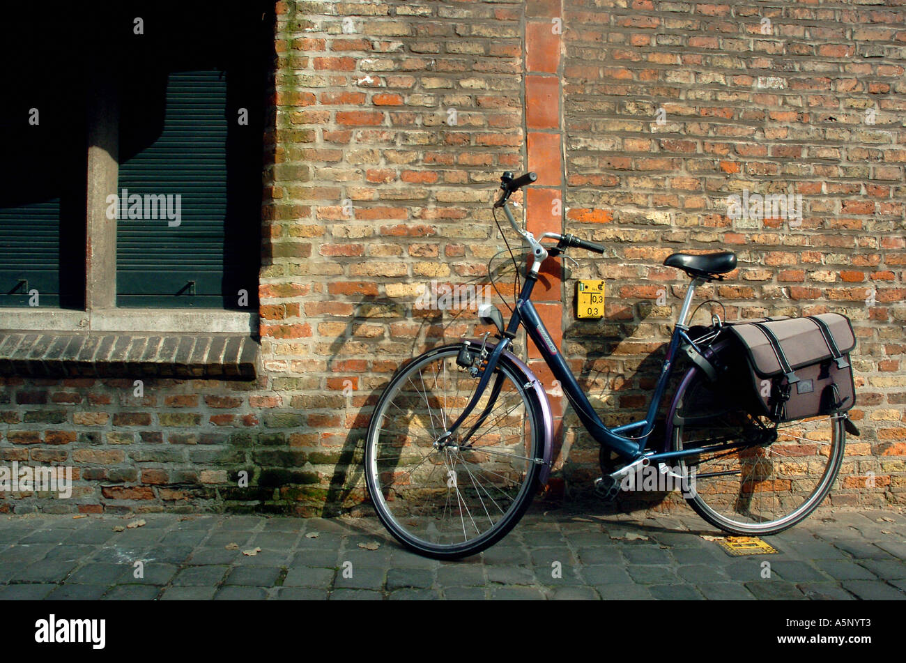 Bicycle left unattended Stock Photo - Alamy