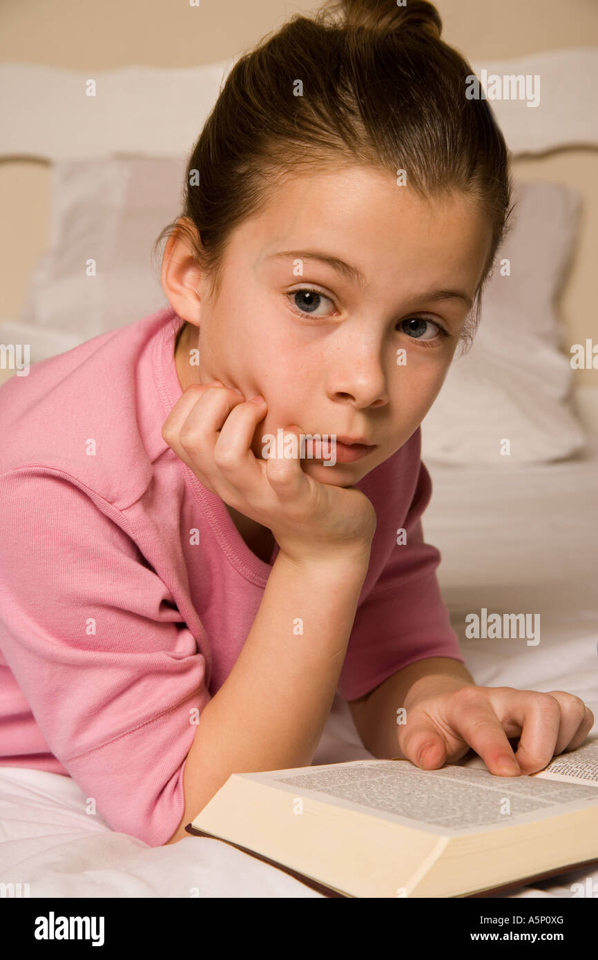 Young girl reading The Bible Stock Photo - Alamy Young girl reading The Bible Stock Photo - Alamy