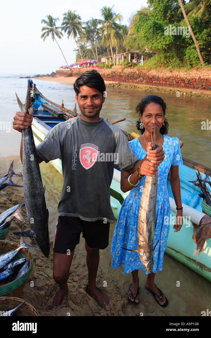 Local commercial fishermen landing their catch on Baga beach Goa India ...