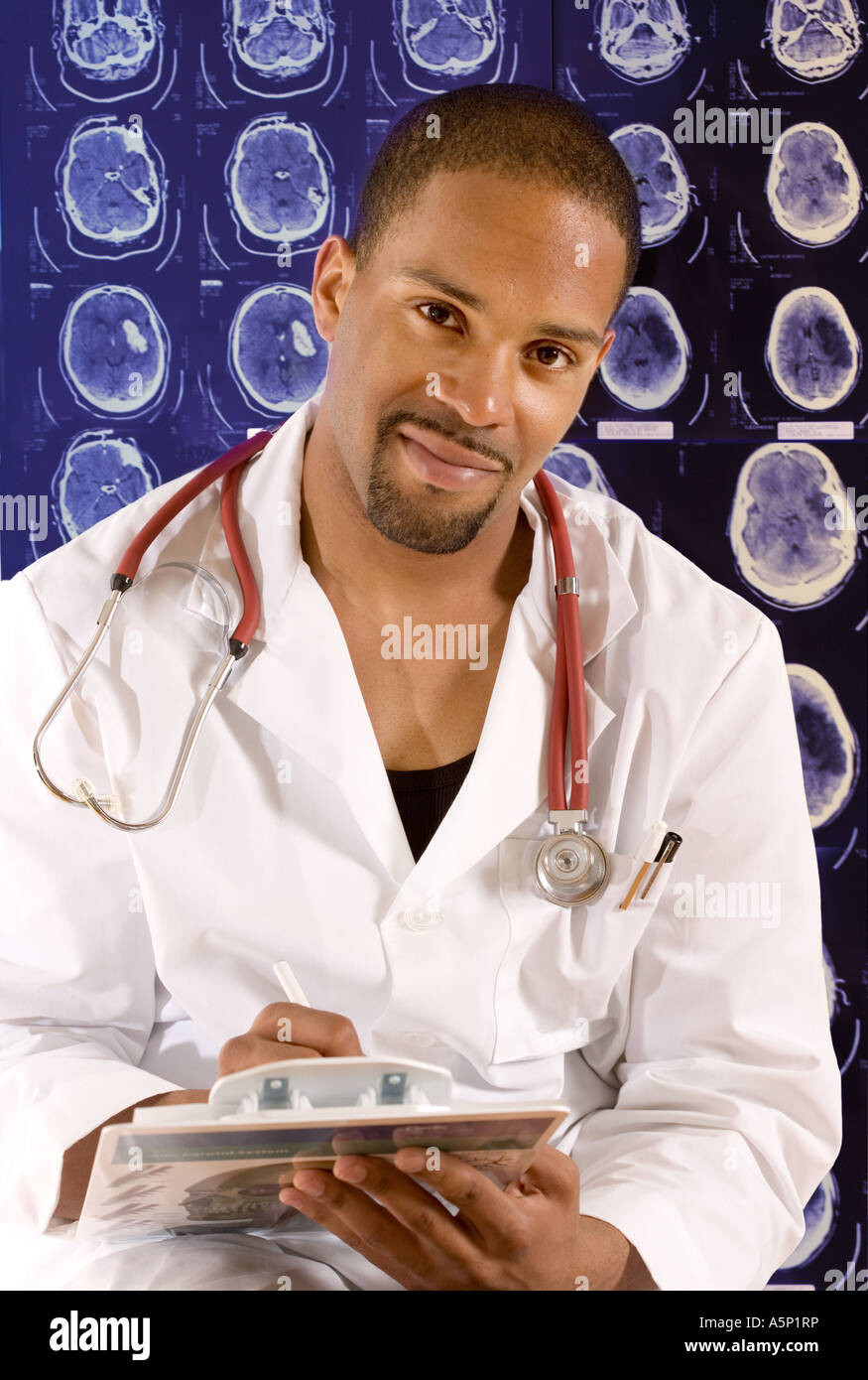 Black doctor / physician records information Stock Photo - Alamy