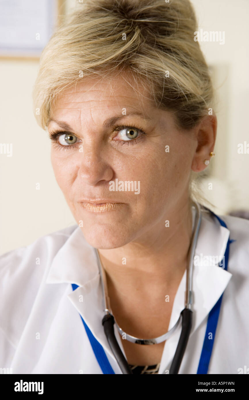 Healthcare worker. Portrait of a female physician / doctor played by a ...