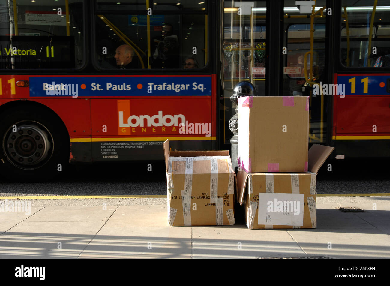 Rubbish and red bus hi-res stock photography and images - Alamy