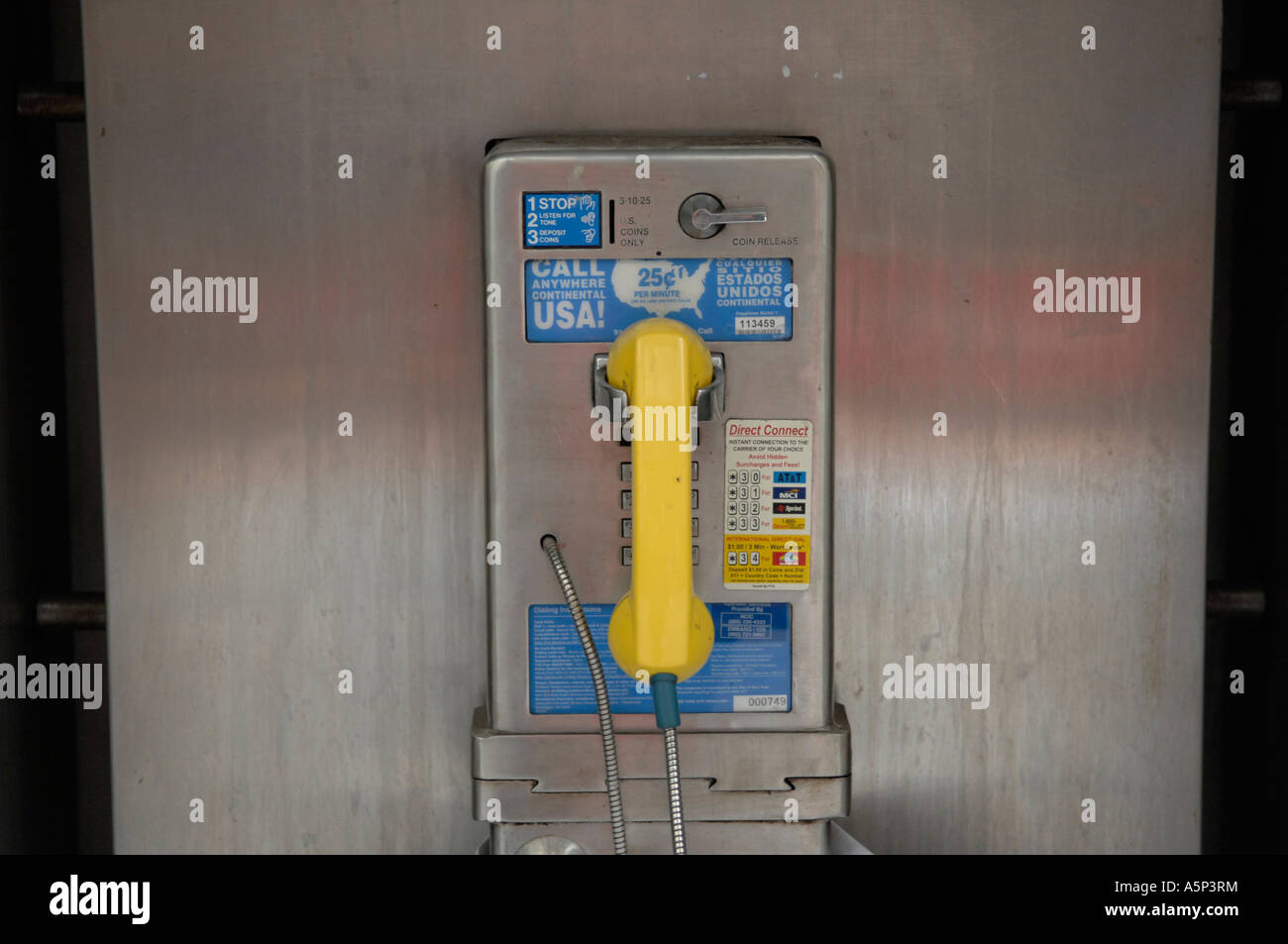 New York Yellow Telephone Box Stock Photo - Alamy