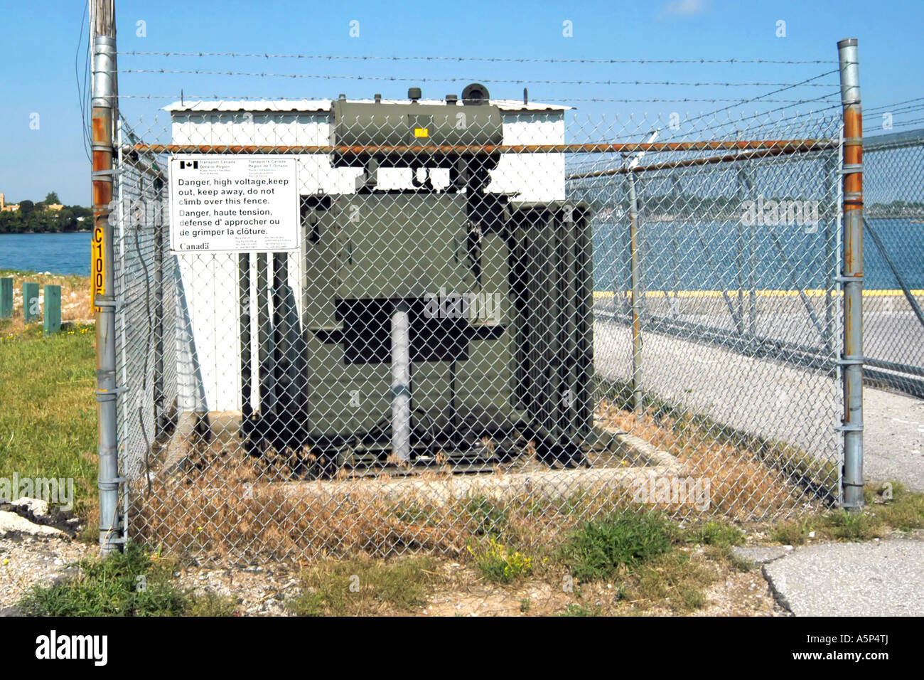 A caged oil cooled electricity Transformer Stock Photo - Alamy