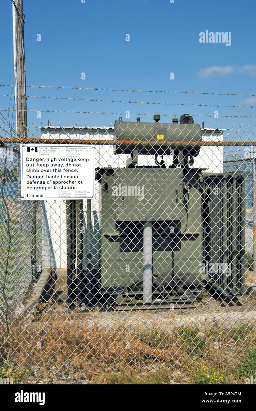 A caged oil cooled electricity Transformer Stock Photo - Alamy