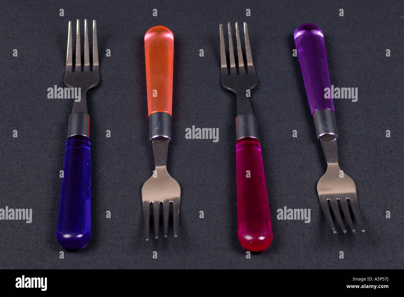 Group of Multi colored handled forks Stock Photo - Alamy