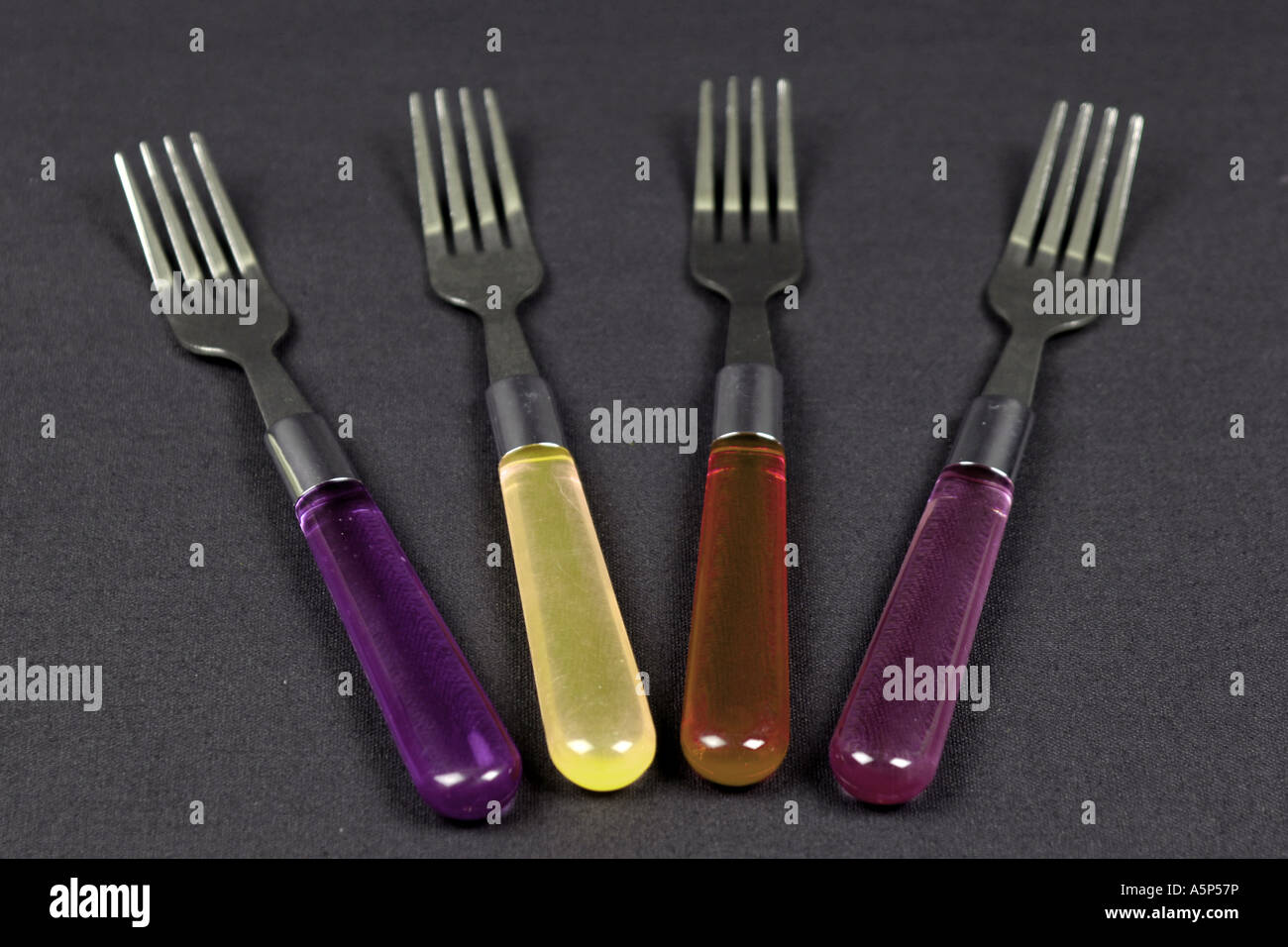 Group of Multi colored handled forks Stock Photo - Alamy
