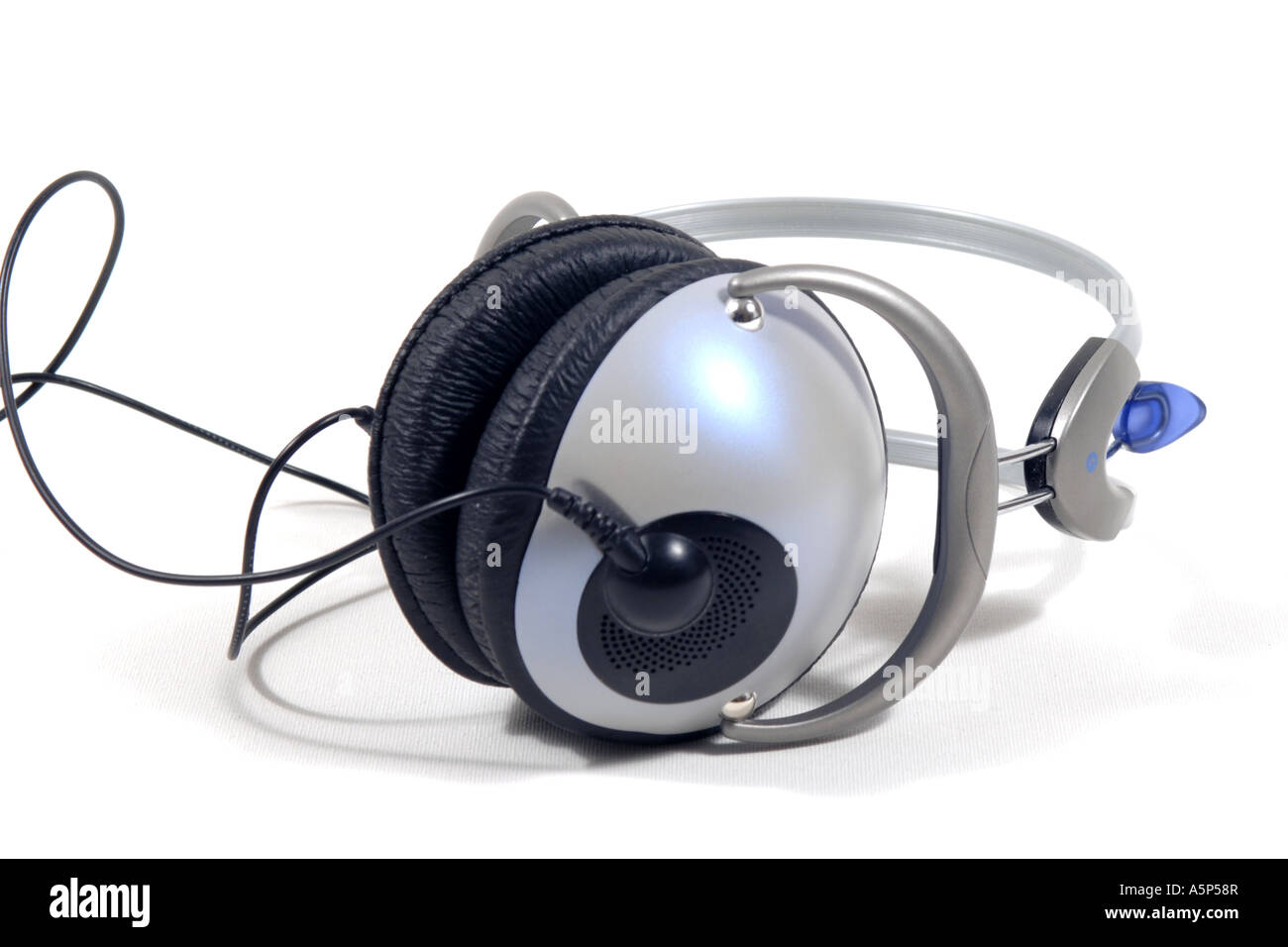 A set of Silver colored headphones against a white background Stock ...