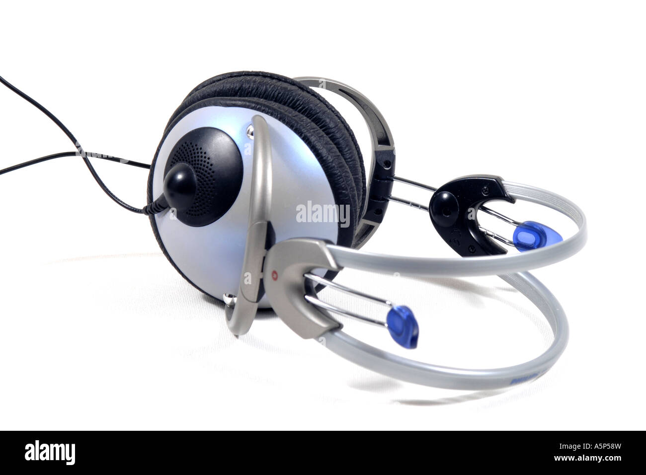 A set of Silver colored headphones against a white background Stock ...