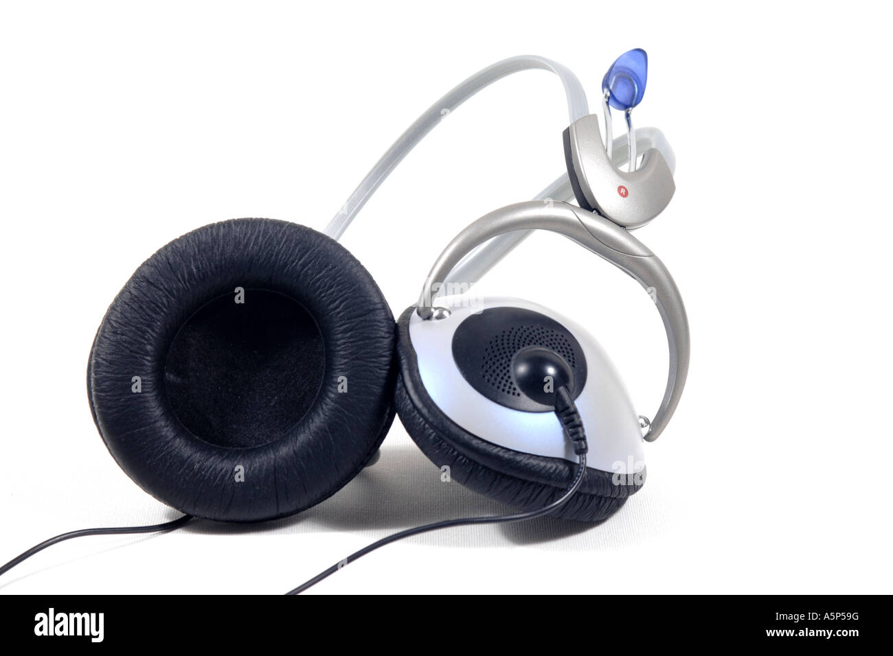 A set of Silver colored headphones against a white background Stock ...