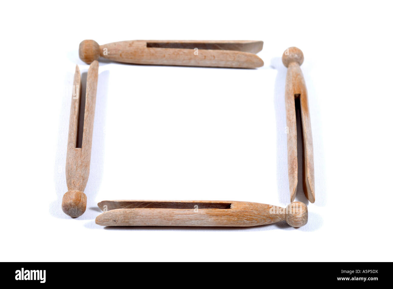 Wooden washing line pegs Stock Photo - Alamy