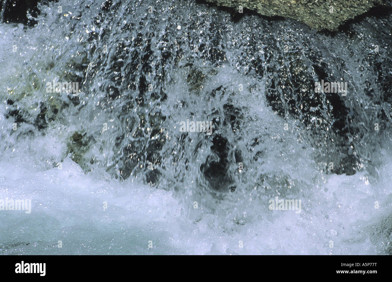 Scenic waterflow over rocks Stock Photo - Alamy