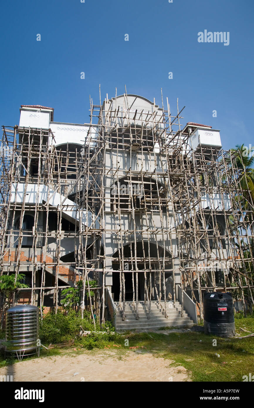New build, Asian housing construction site; concrete and wooden asian ...