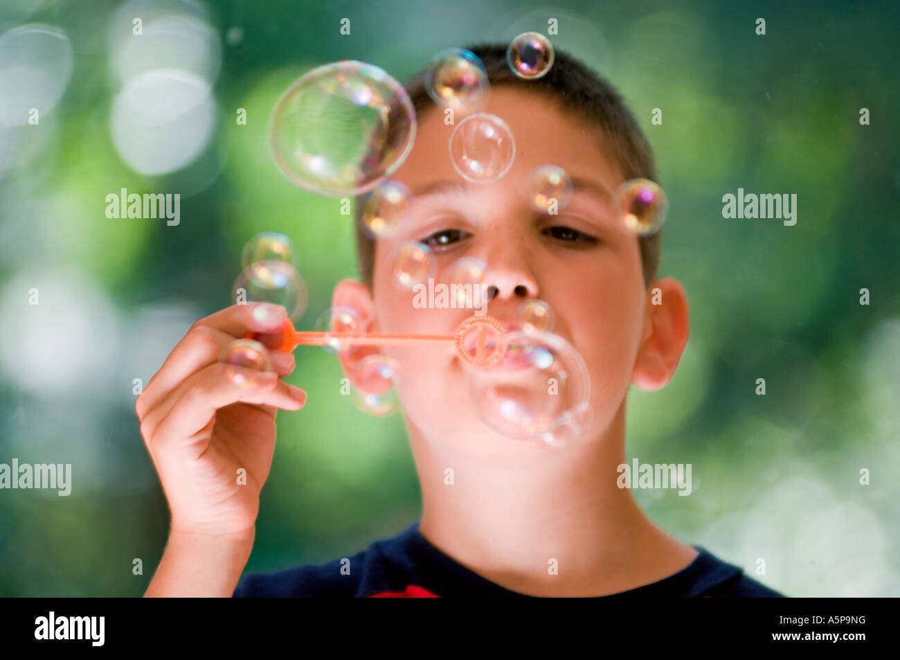 Blowing soapy bubbles hi-res stock photography and images - Alamy