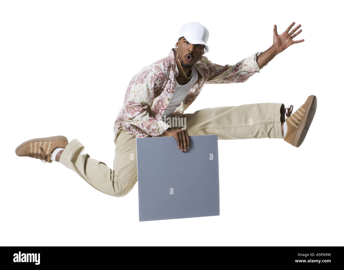 African American man jumping and holding a blank sign Stock Photo - Alamy