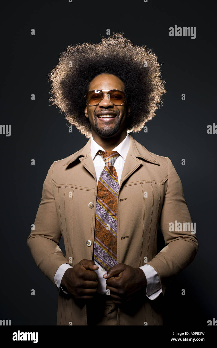 Man afro in beige suit hi-res stock photography and images - Alamy