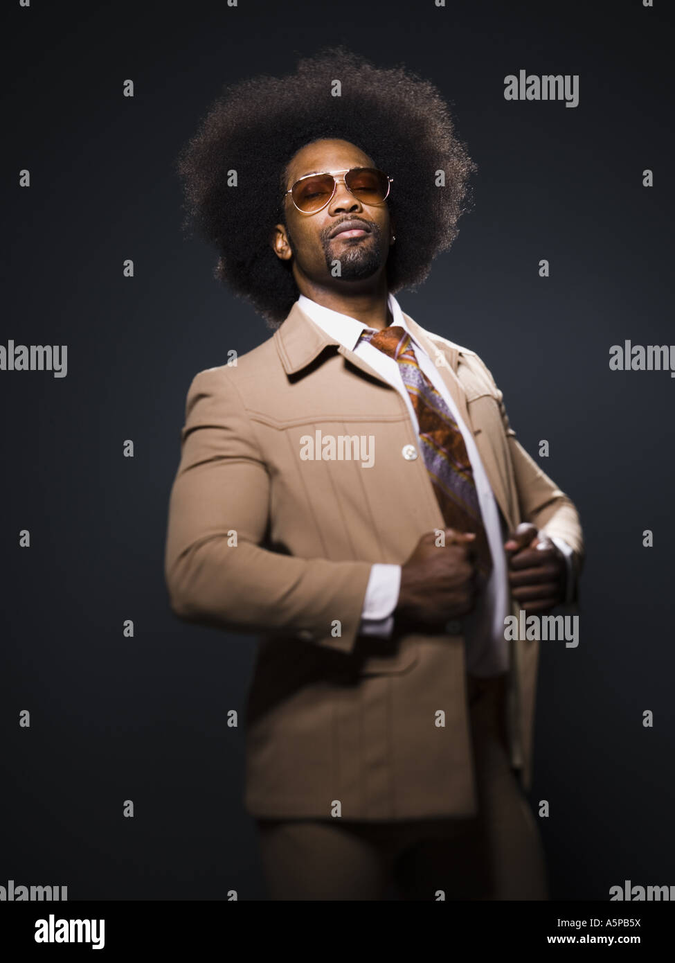 Man afro in beige suit hi-res stock photography and images - Alamy