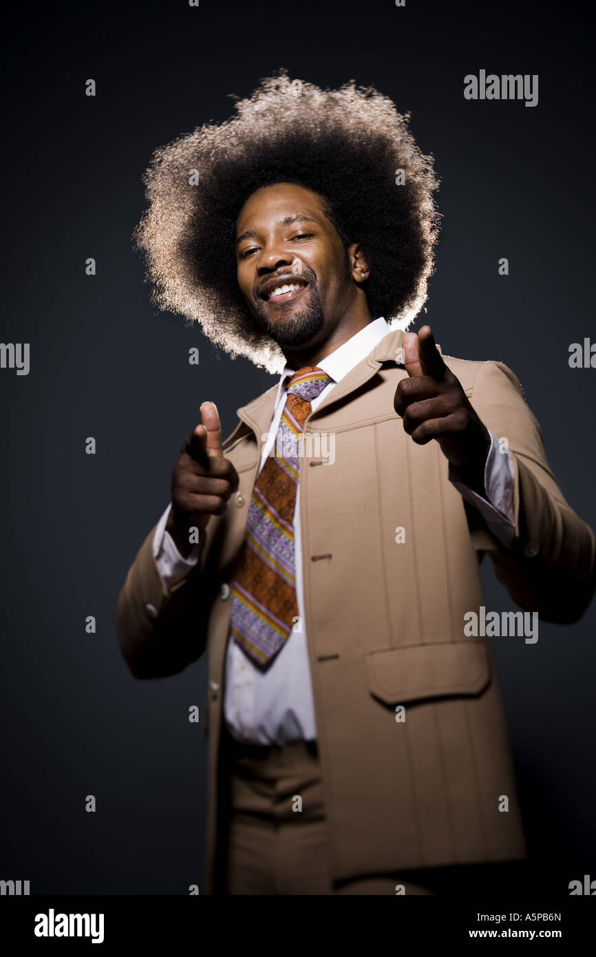 Man in suit points hi-res stock photography and images - Alamy