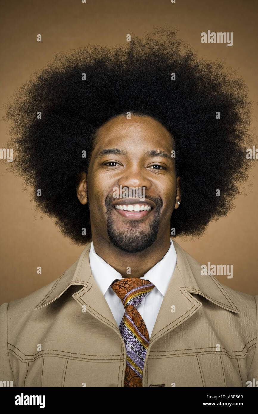Man afro in beige suit hi-res stock photography and images - Alamy
